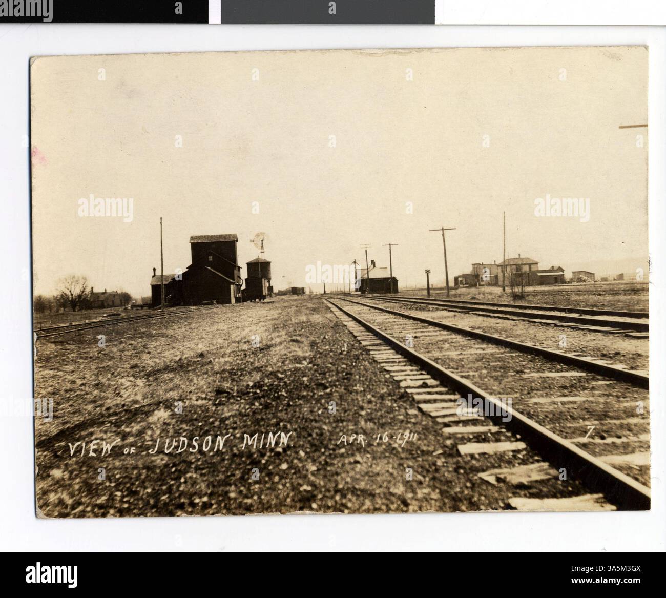 A view of Judson, Minnesota, featuring the railroad tracks and station ...