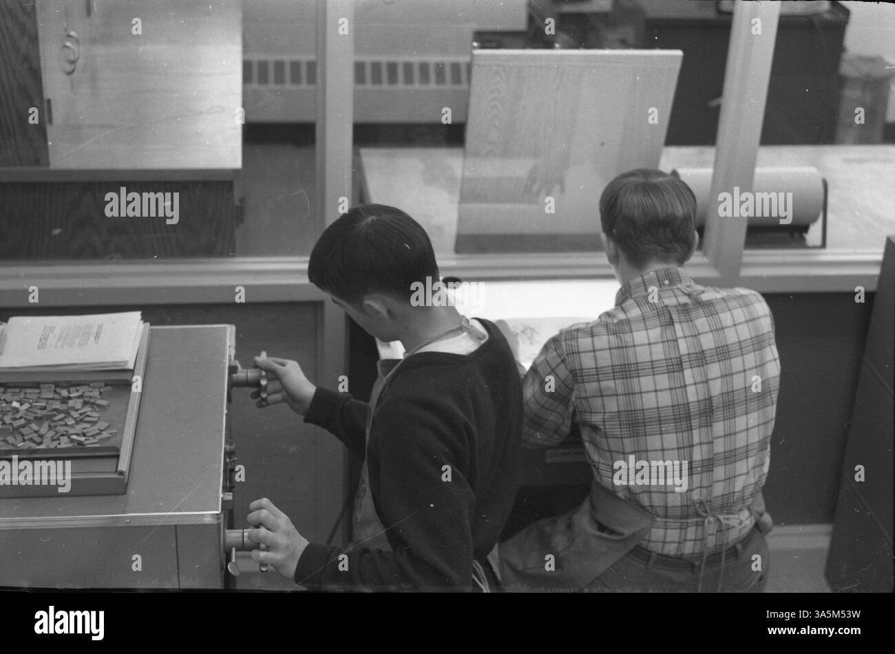 Students at hennepin county library are shown learning typesetti hi-res ...