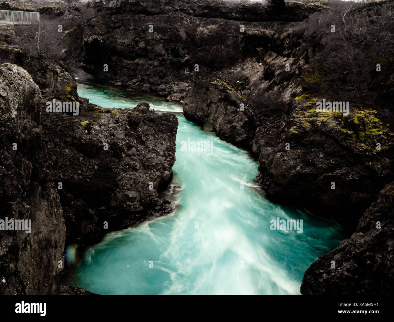 Barnafoss is a stunning Icelandic waterfall with turquoise water ...