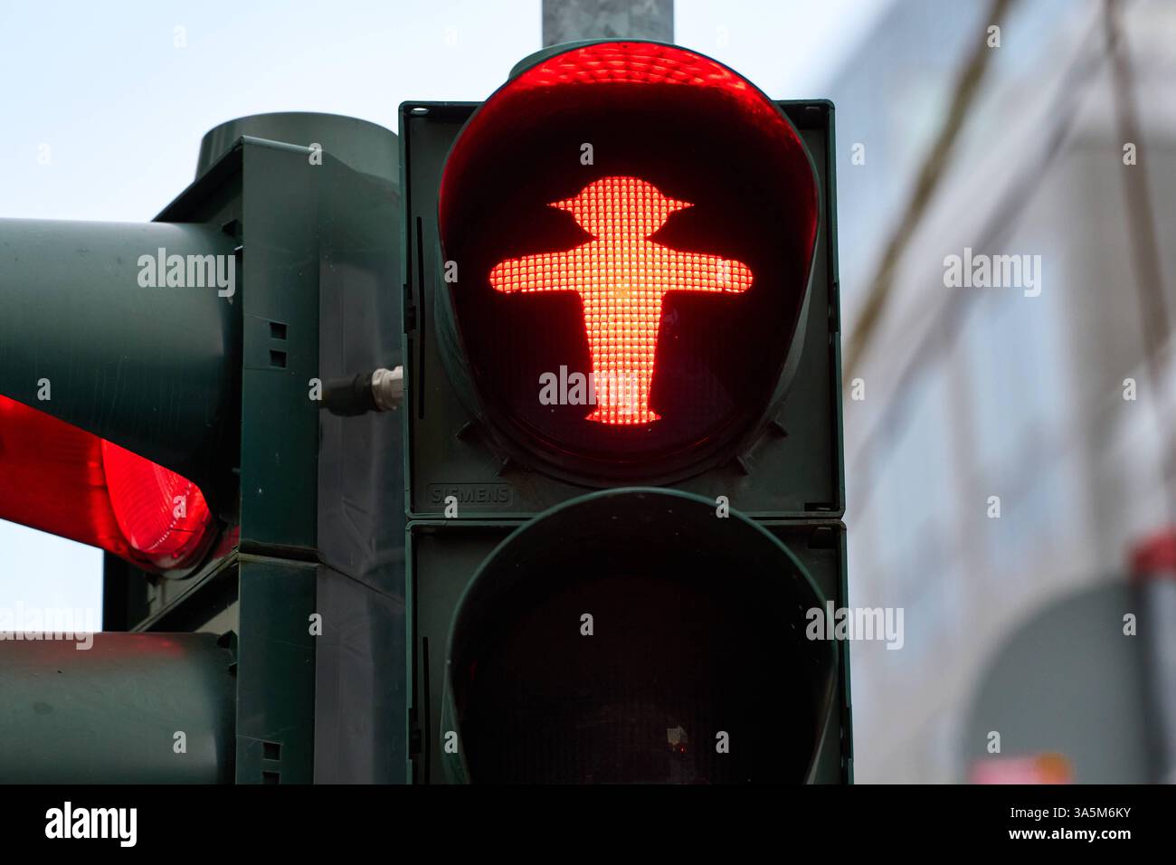 Berlin, Germany - March 23, 2025: The famous Berlin traffic light man ...
