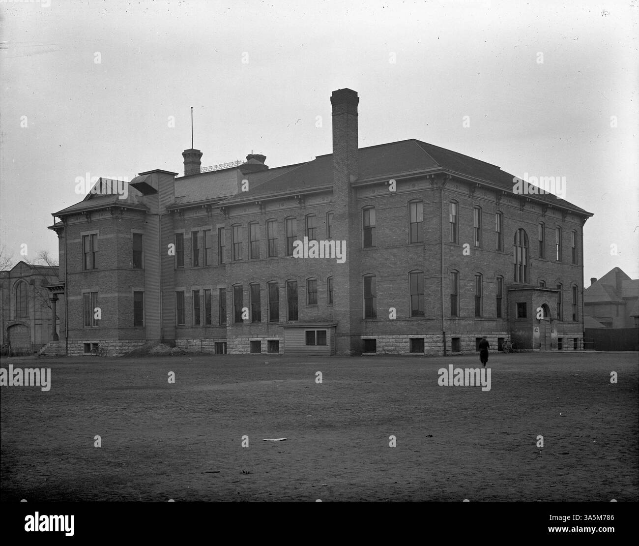 This photograph captures the rear view of Garfield School, showcasing ...