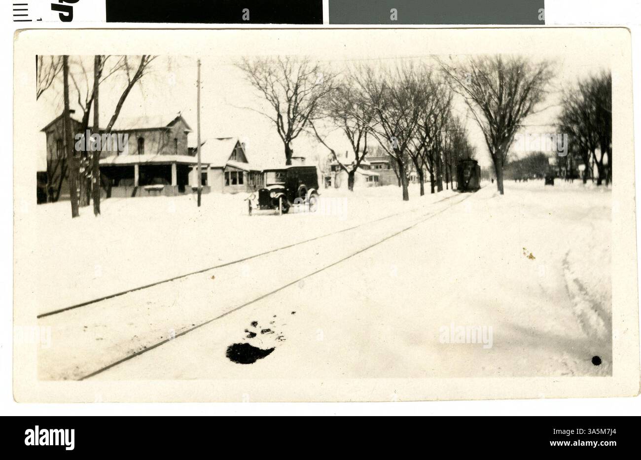 This image shows a streetcar traveling along North Broad Street in ...