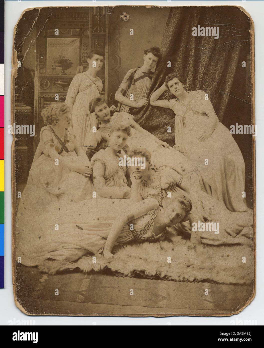 Studio portrait of eight women posing as greek dancers hi-res stock ...