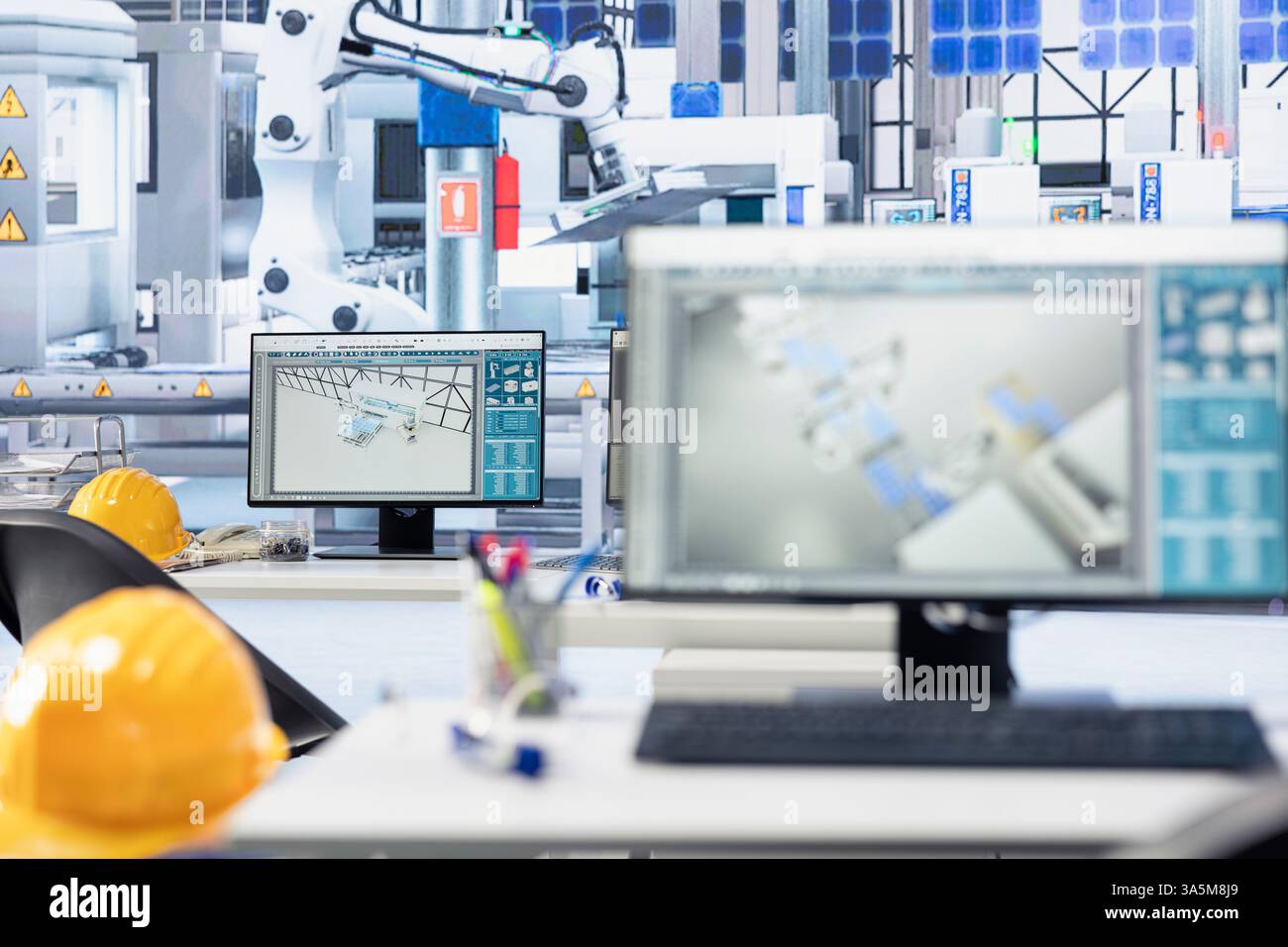 PC screen on desk in empty photovoltaics factory used for analyzing data and reviewing system ...