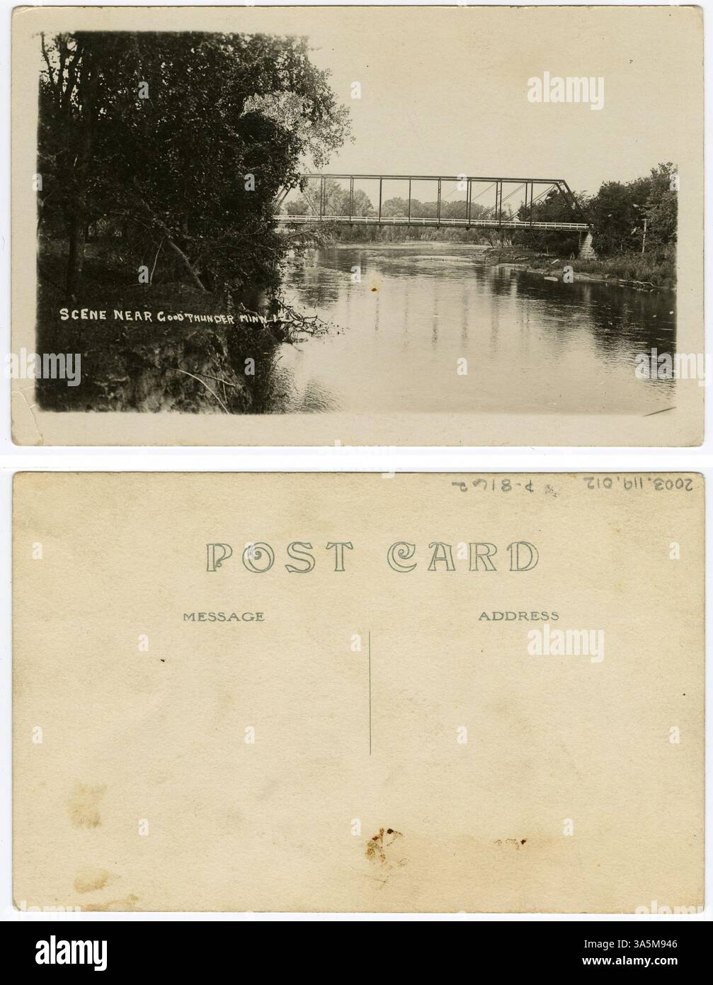 A river scene near Good Thunder, Minnesota, showing a river and bridge ...