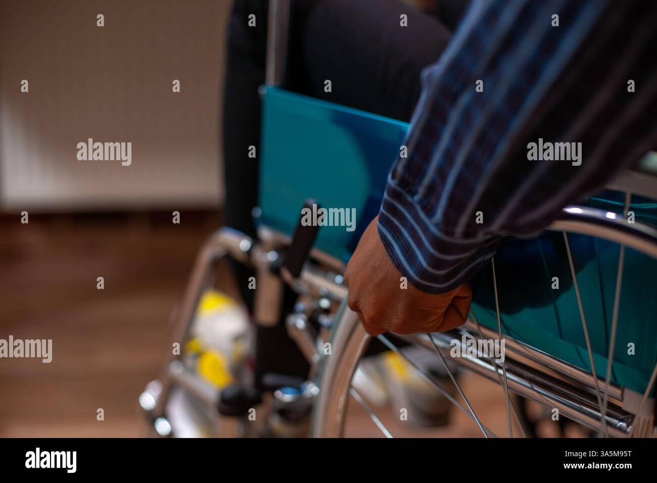Closeup on hands of african american person spinning wheel of his ...