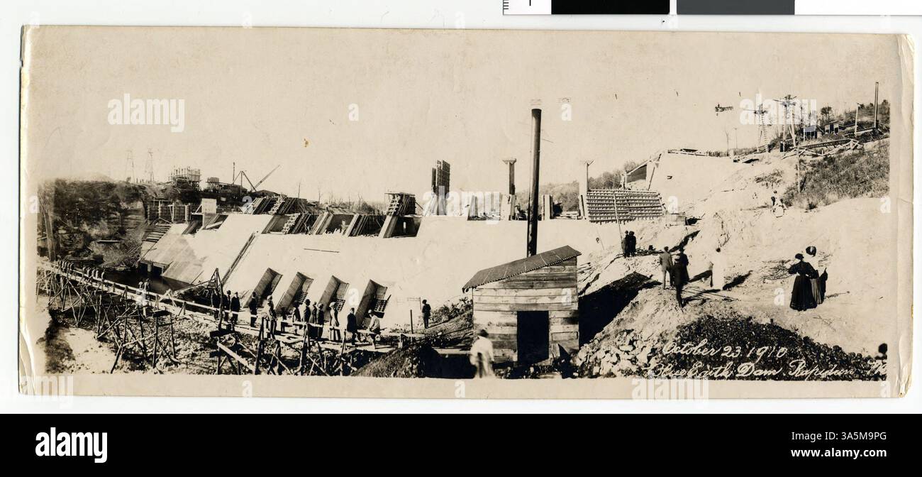This historical photo shows people observing the construction of the ...