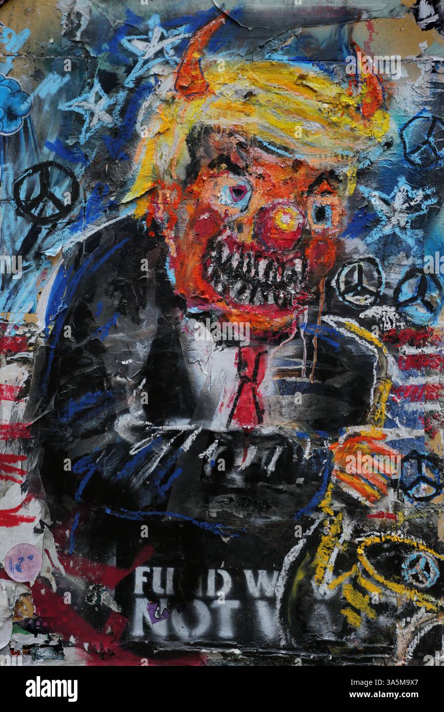 London, England, UK. 23rd Mar, 2025. A piece of art depicts President ...