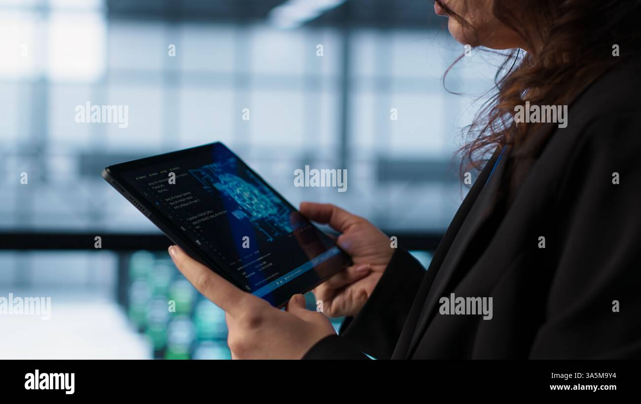 Engineer In Data Center With Tablet Integrating Ai Driven Automation Tools Worker Ensuring