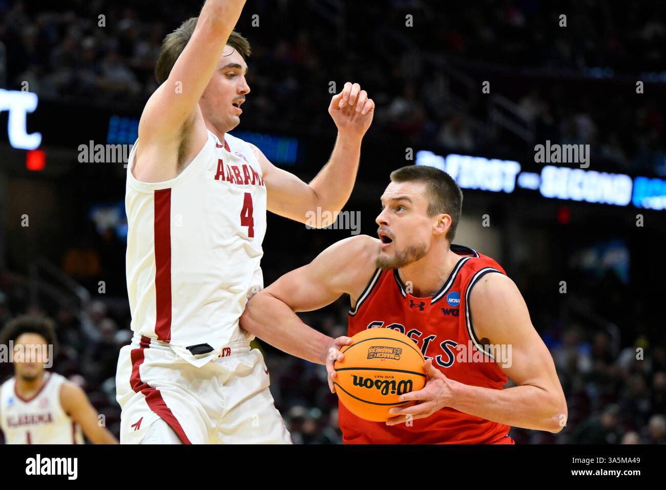 Alabama forward Grant Nelson (4) defends Saint Mary's center Mitchell ...