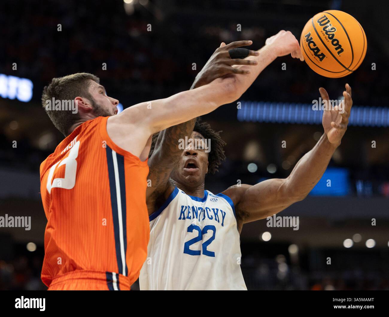 Illinois center Tomislav Ivisic (13) reaches for a rebound against ...