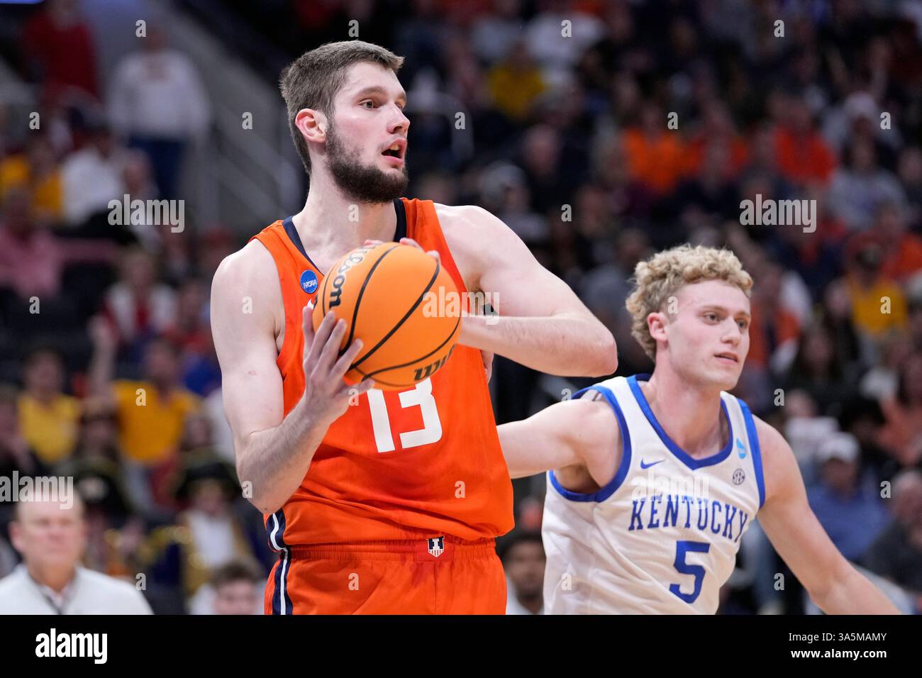 Illinois center Tomislav Ivisic (13) looks to pass the ball against ...