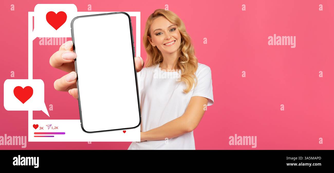 Engaging social media influencer showcasing smartphone with blank ...