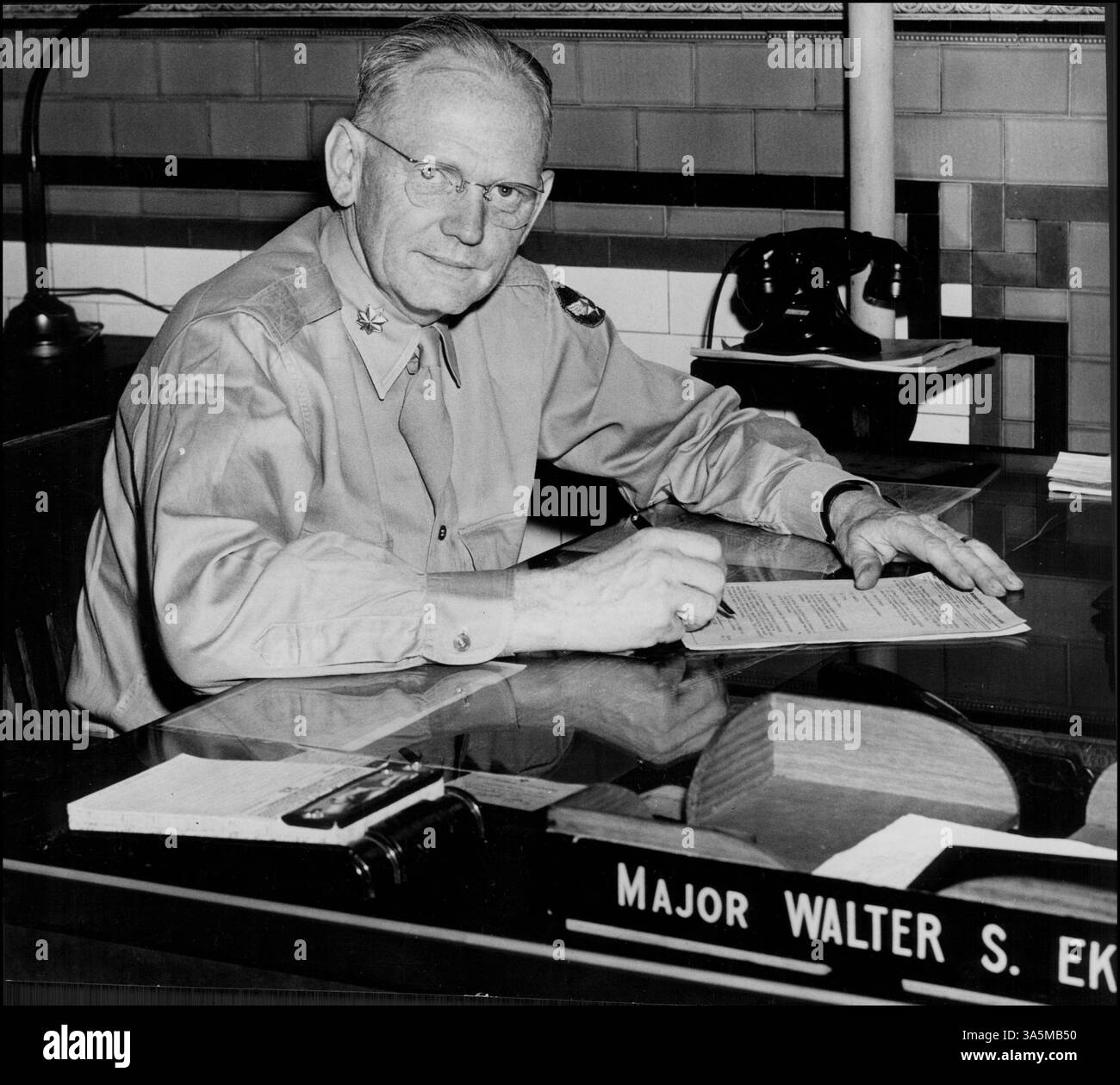 Major Walter S. Ek, shown at his desk, was in command of the 833rd Army ...