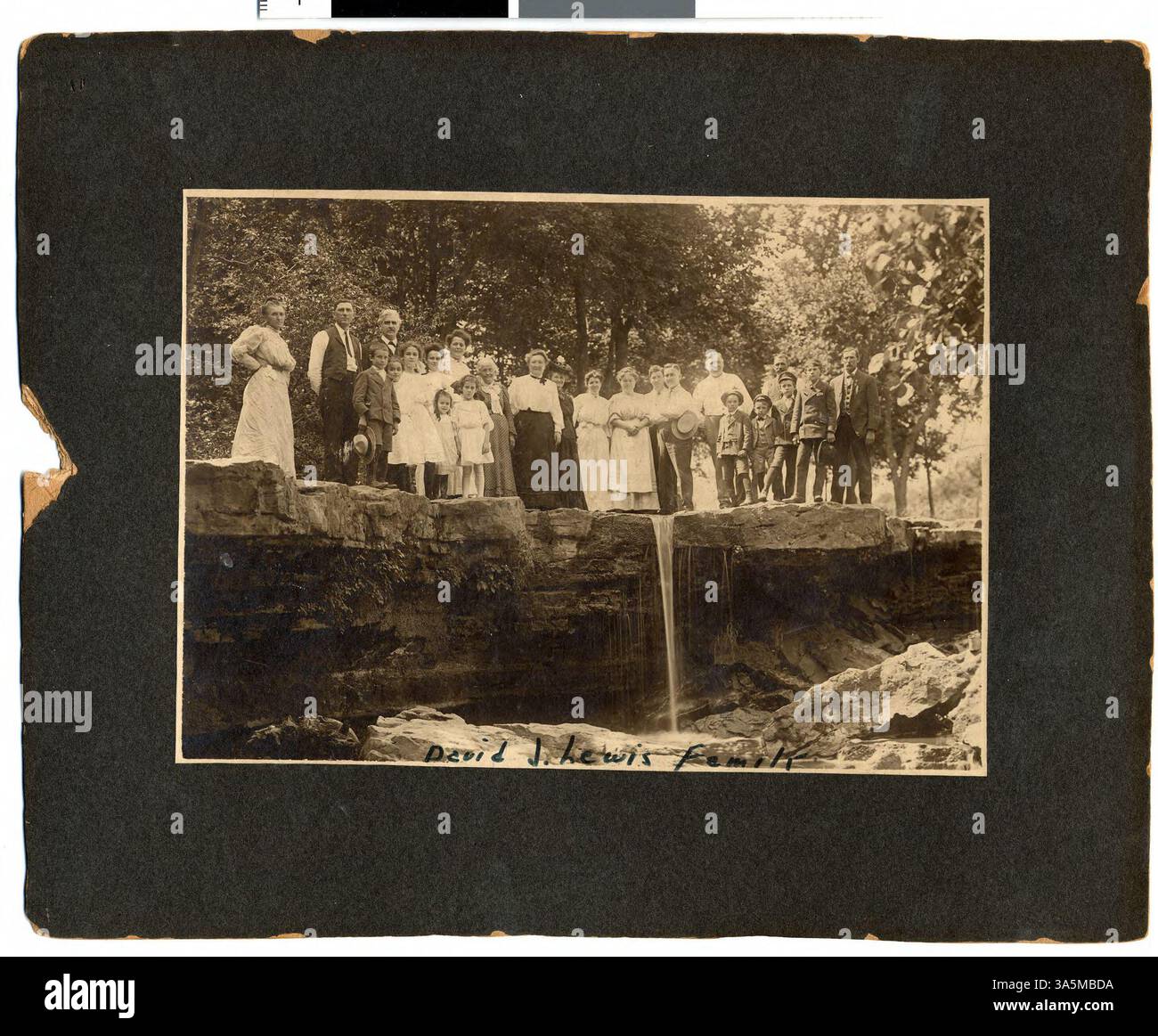 The David J. Lewis family gathered on the cliffs above the water at ...