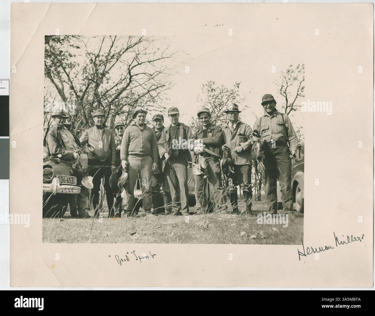 Group photo of men after a pheasant hunting trip in Blue Earth County ...