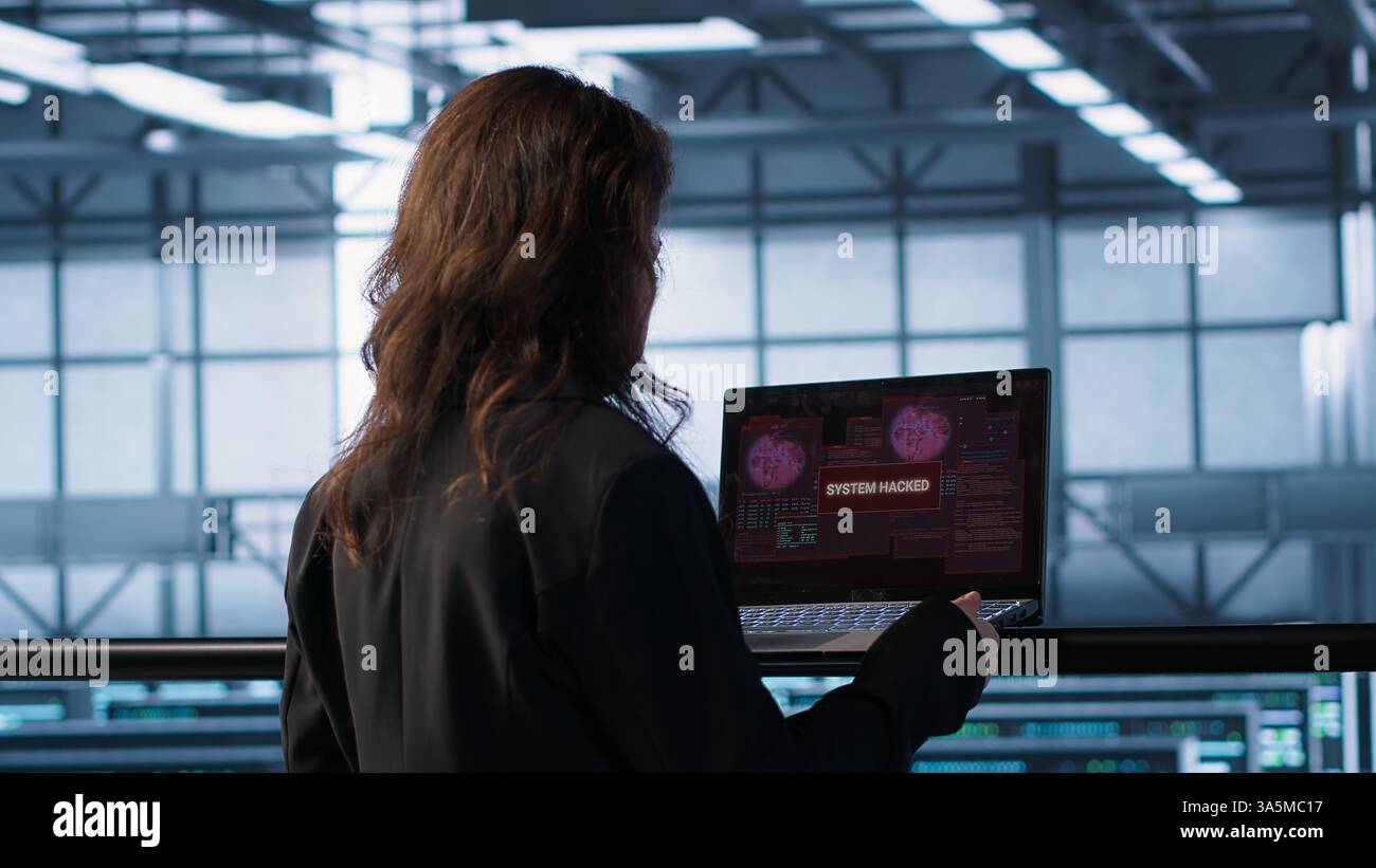 Cybersecurity expert in data center frantically trying to counter a ...