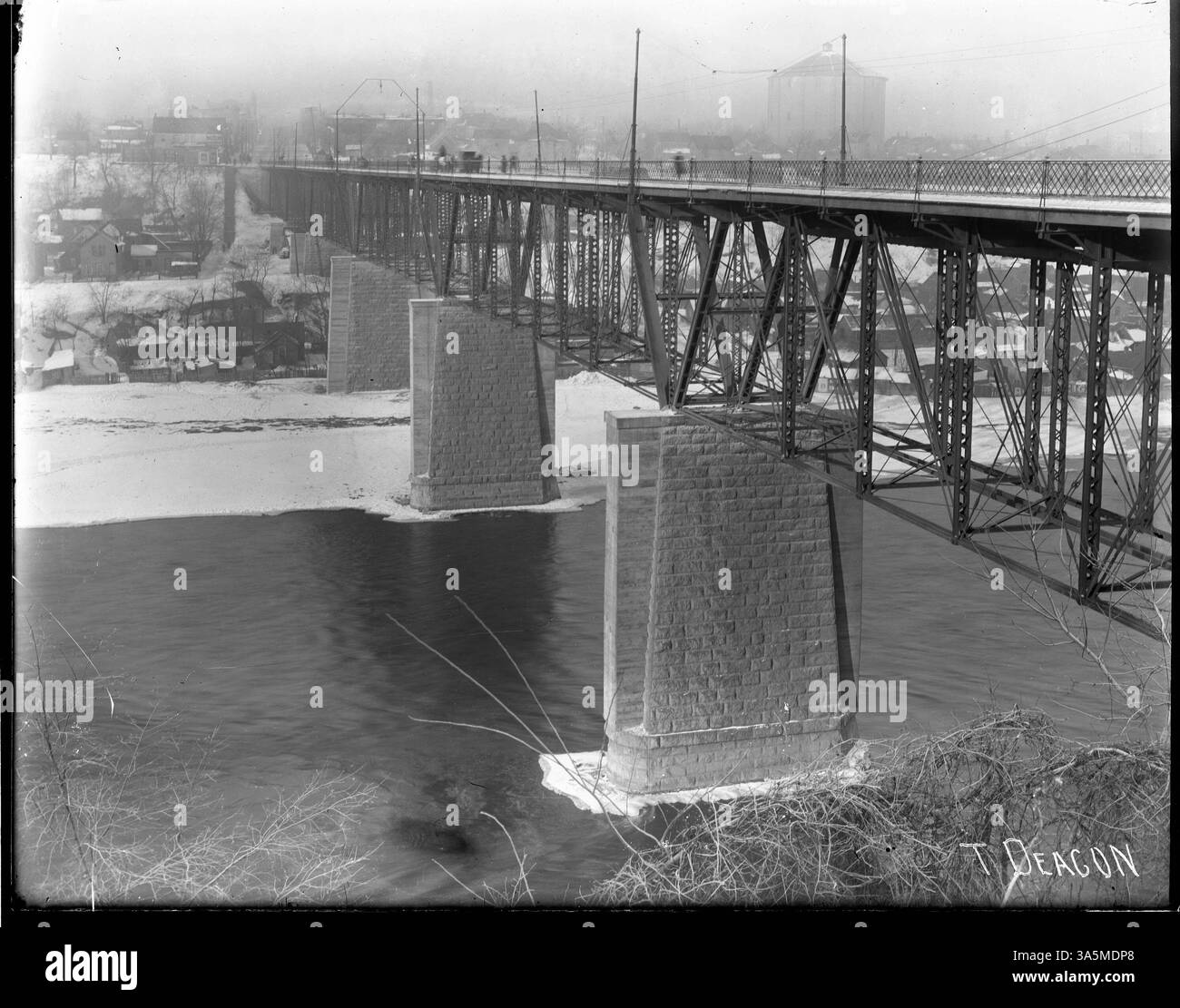 The Washington Avenue Bridge, spanning the Mississippi River near ...