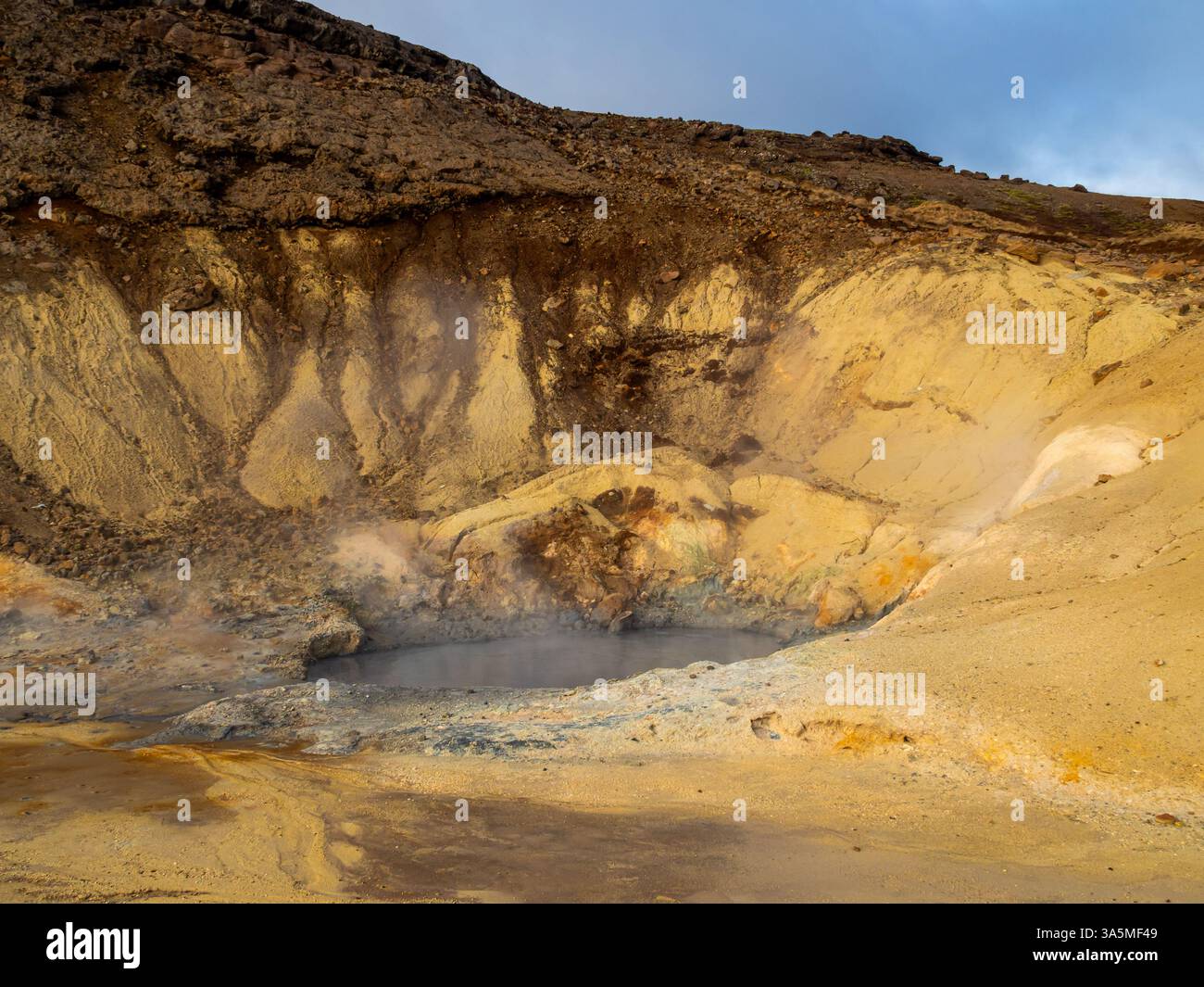 Steaming geothermal pool in Seltún, Krýsuvík, Iceland. Vibrant mineral ...