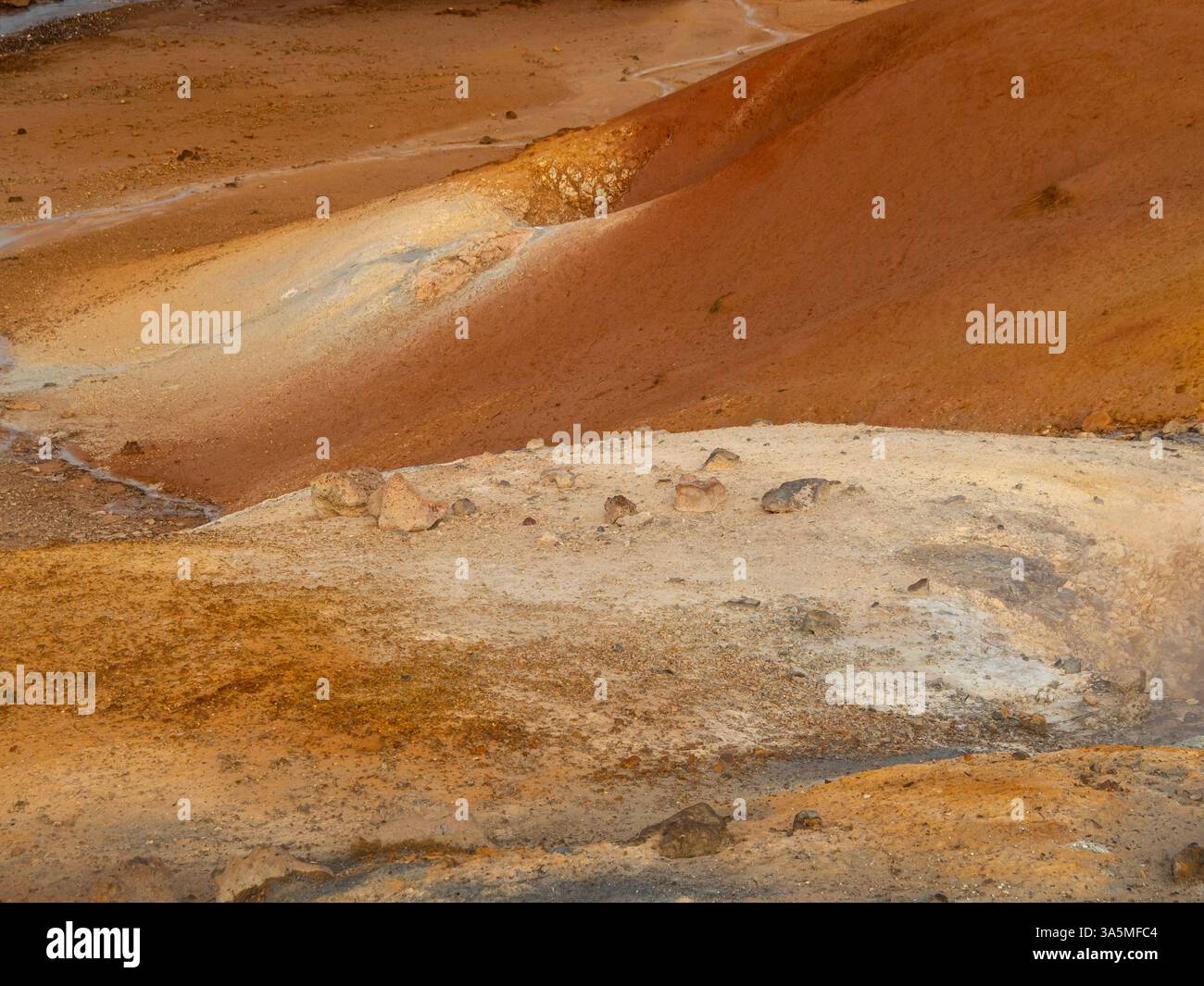 Colorful mineral-rich hills in Seltún's geothermal field, shaped by ...