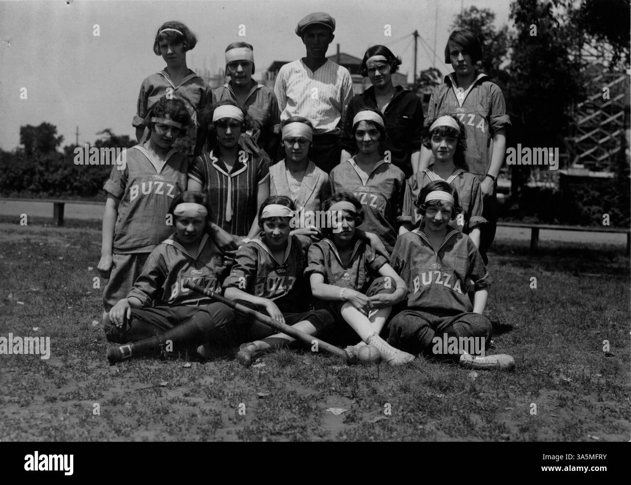 The 1924 Buzza Company Women's Baseball Team posed for a photo ...