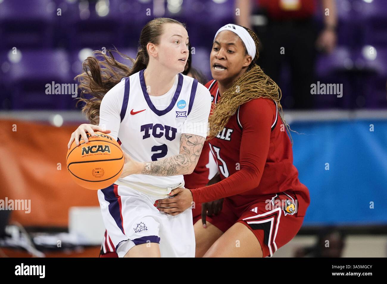 TCU's Madison Conner (2) looks to pass the ball as Louisville's ...