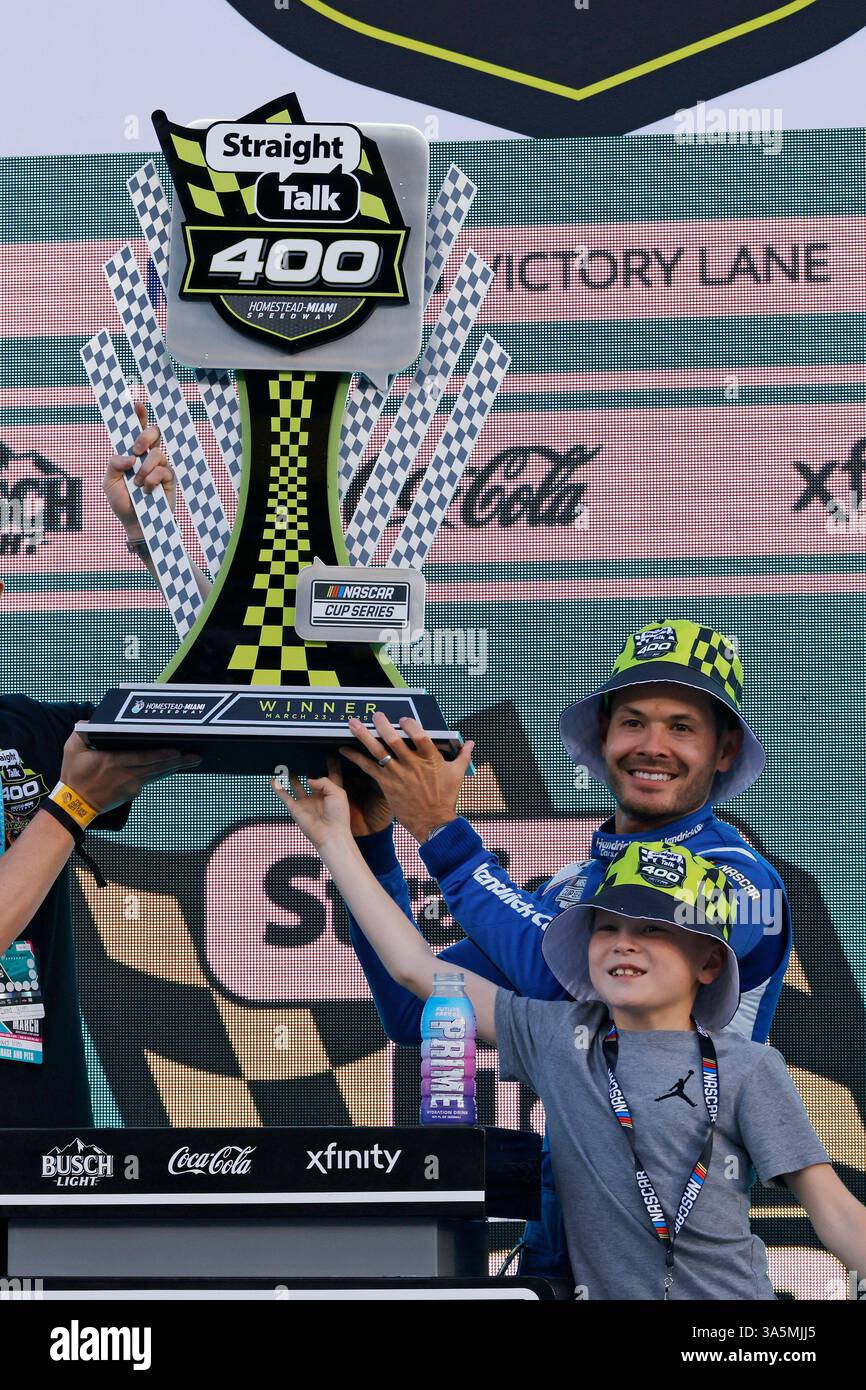 Kyle Larson, upper right, celebrates with his son Owen, bottom right ...