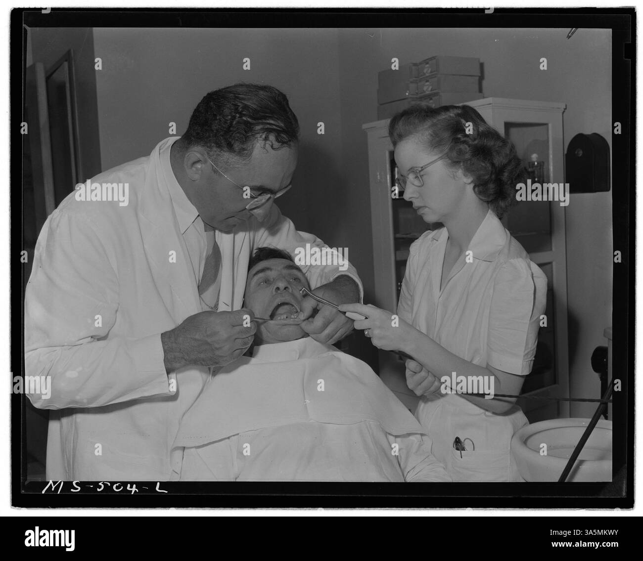 Dental care worker Cut Out Stock Images & Pictures - Alamy