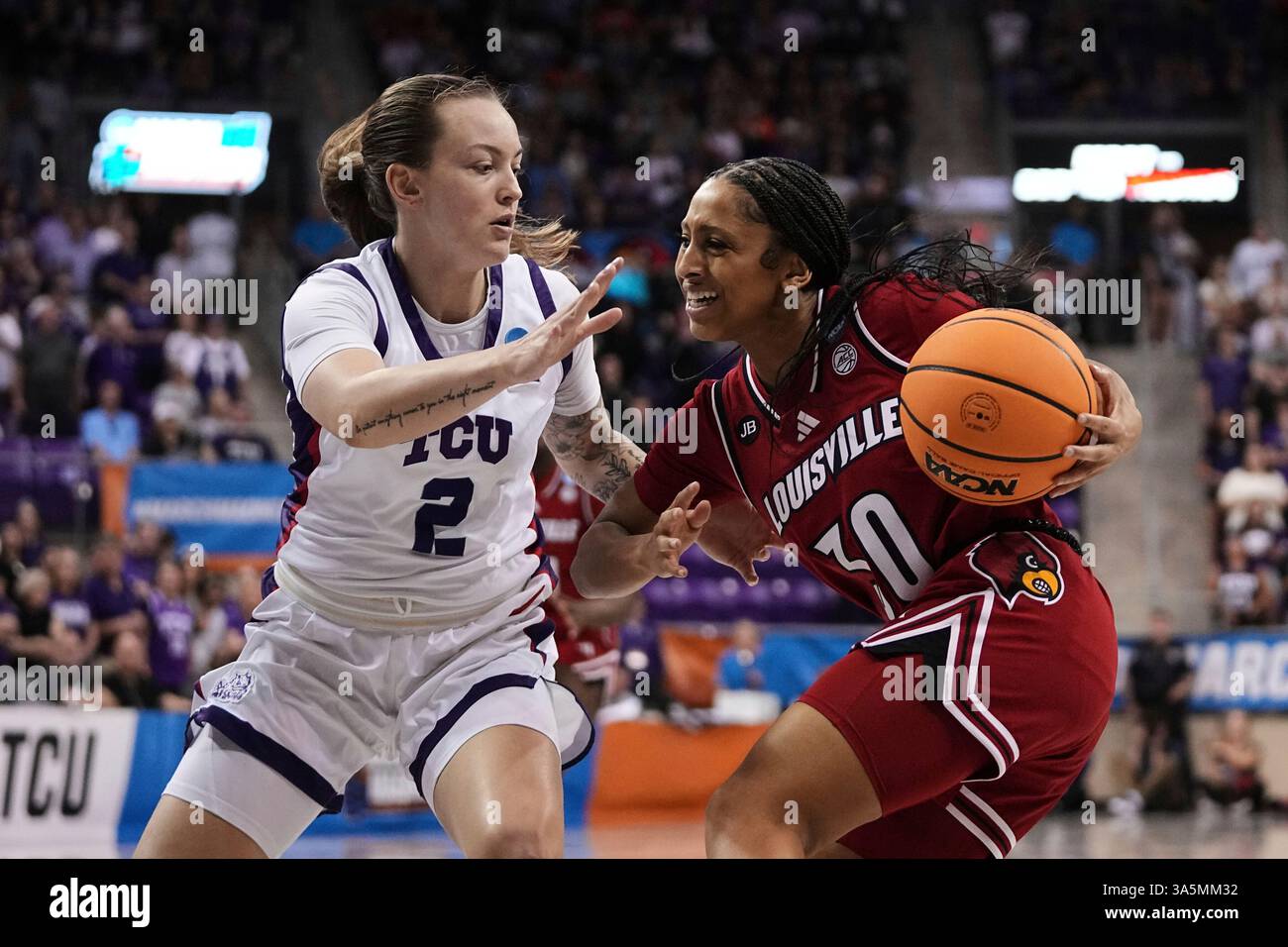 TCU's Madison Conner (2) defends as Louisville's Jayda Curry, right ...