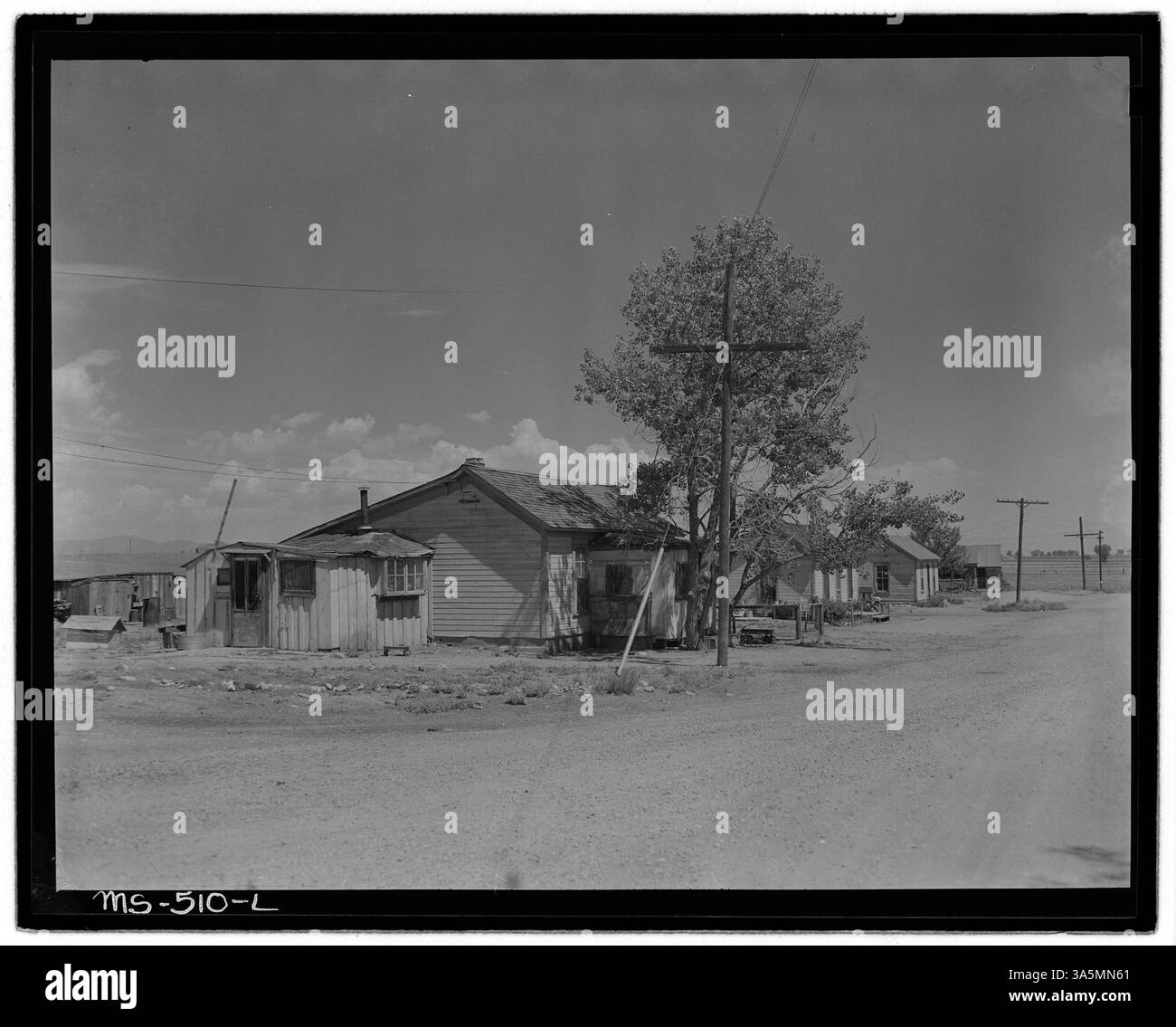 The home of Manuel Alcala, a miner, is part of a company housing ...