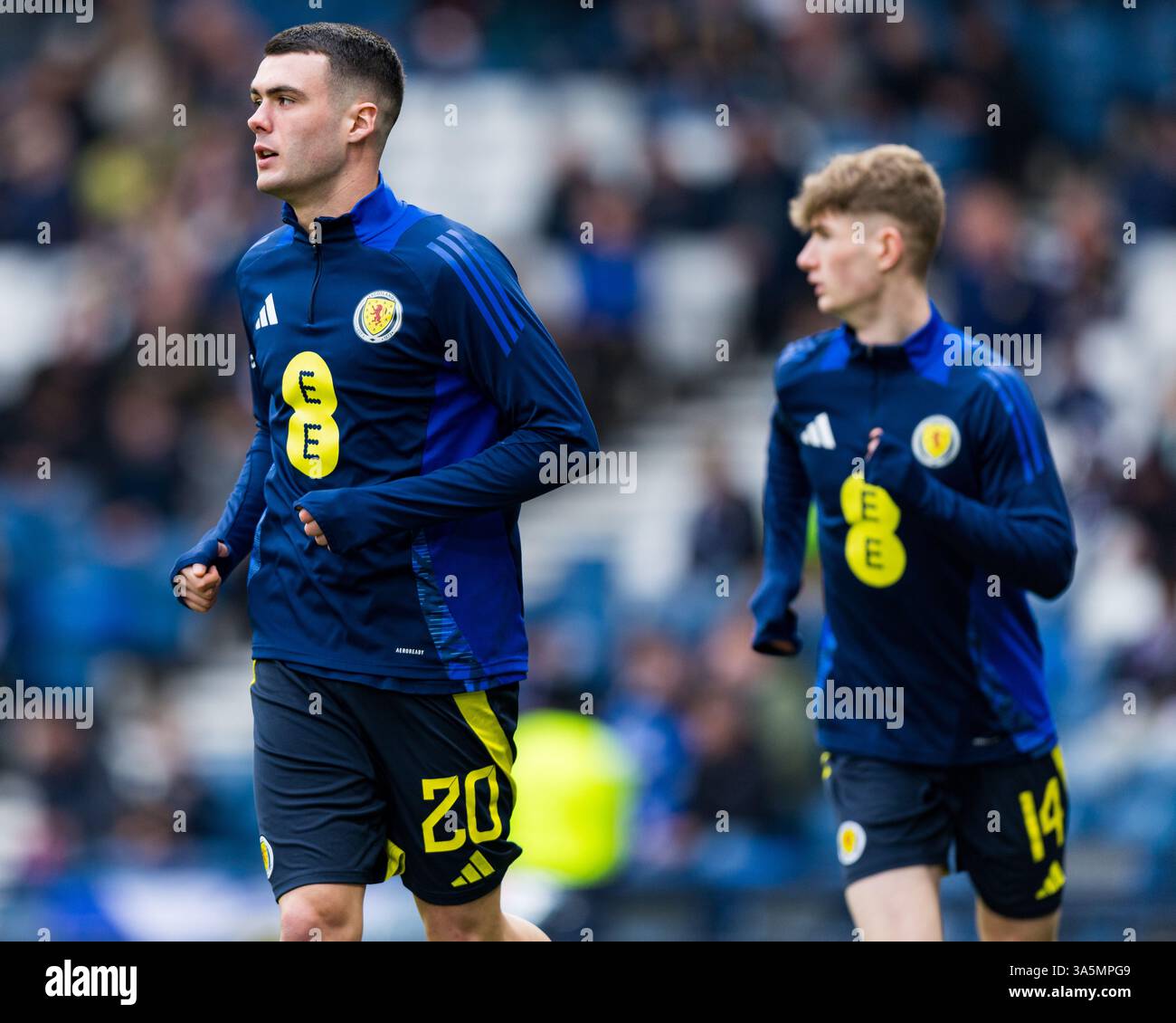 Glasgow, Scotland. 23 March 2025. Lennon Miller (20 - Scotland) warms ...