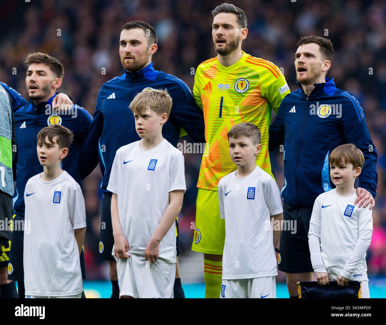 Glasgow, Scotland. 23 March 2025. Scotland players sing the national ...