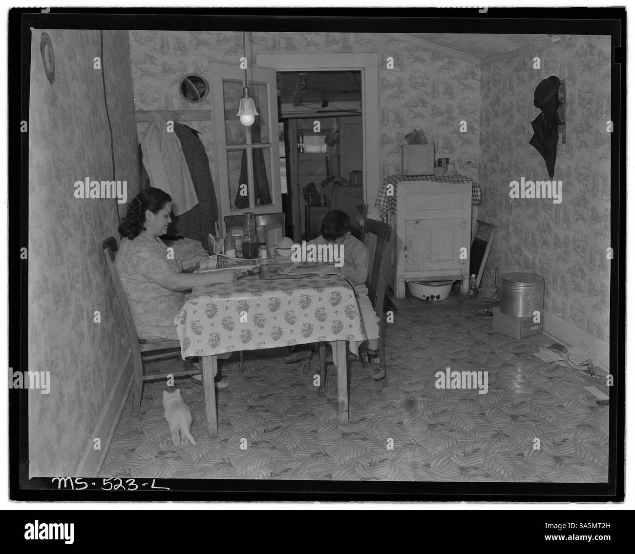 The dining room of Manuel Alcala, a miner employed by National Fuel Company, residing in company ...