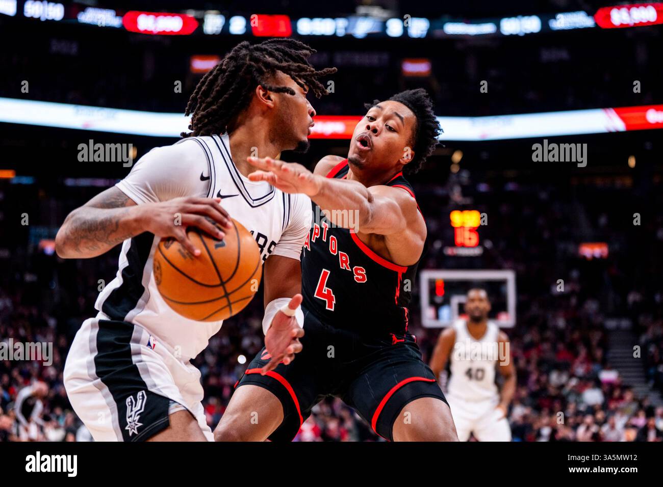 Toronto Raptors forward Scottie Barnes (4) defends against San Antonio ...