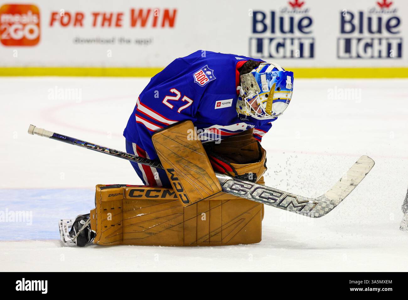March 23rd 2025: Rochester Americans goaltender Devon Levi (27) makes a ...