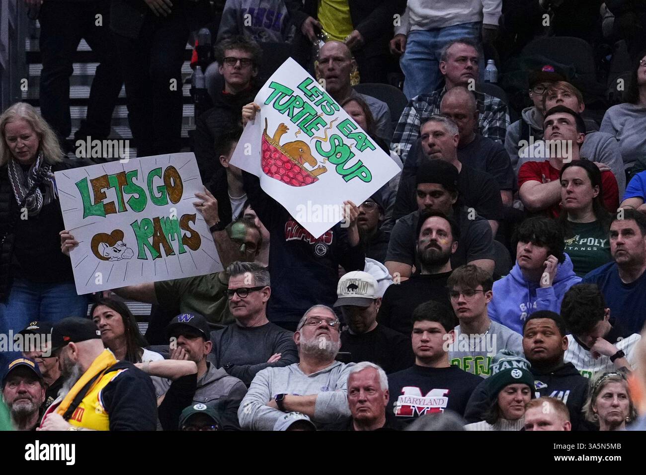Colorado State fans wave signs during the first half against Maryland ...