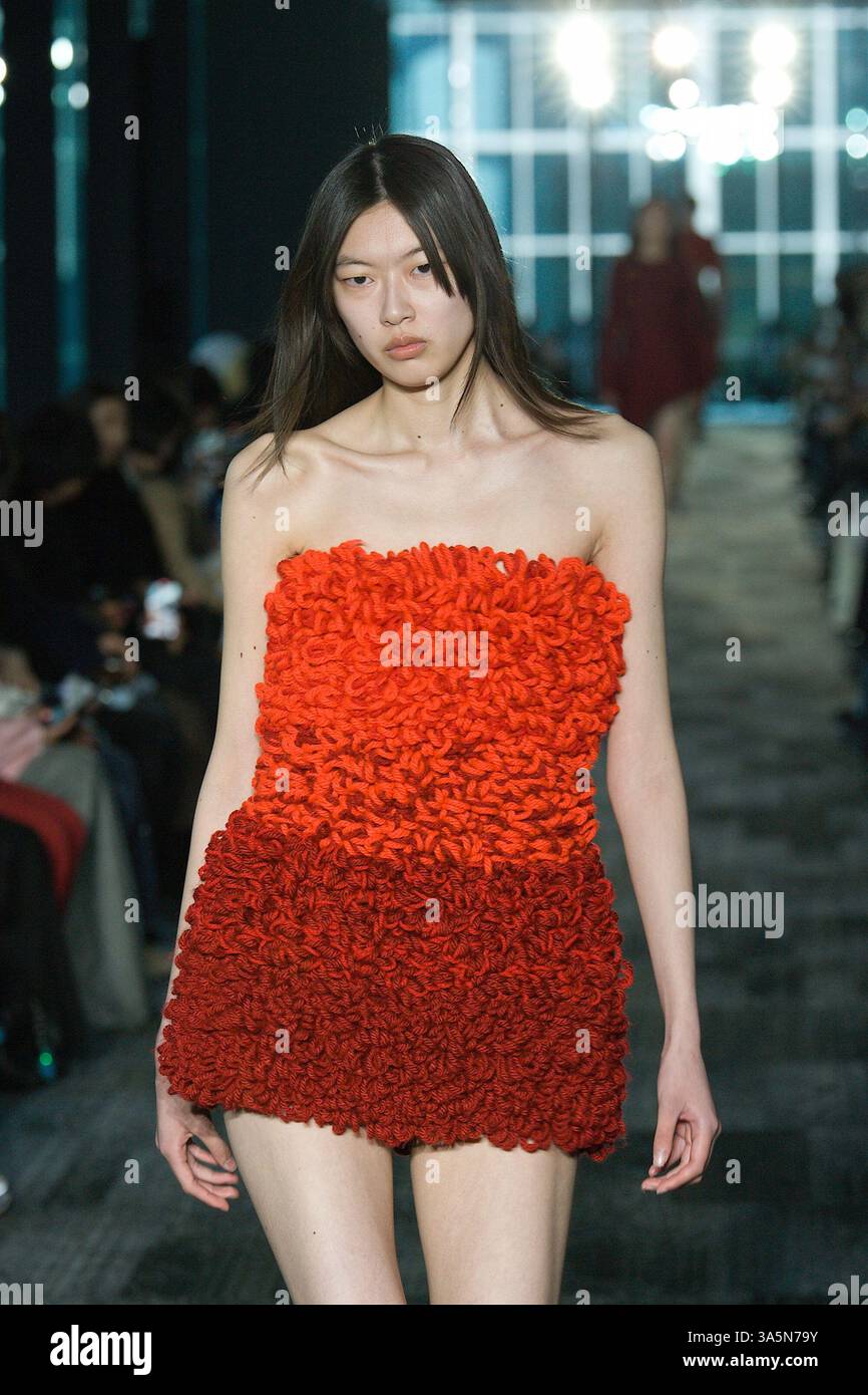 2025/03/20, Tokyo, a Model walks on the Runway at Toda Hall ...