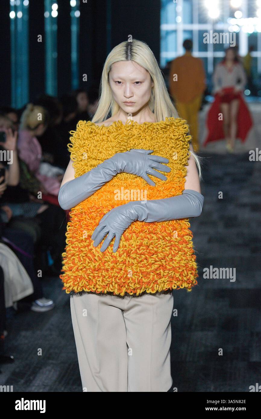 2025/03/20, Tokyo, a Model walks on the Runway at Toda Hall ...