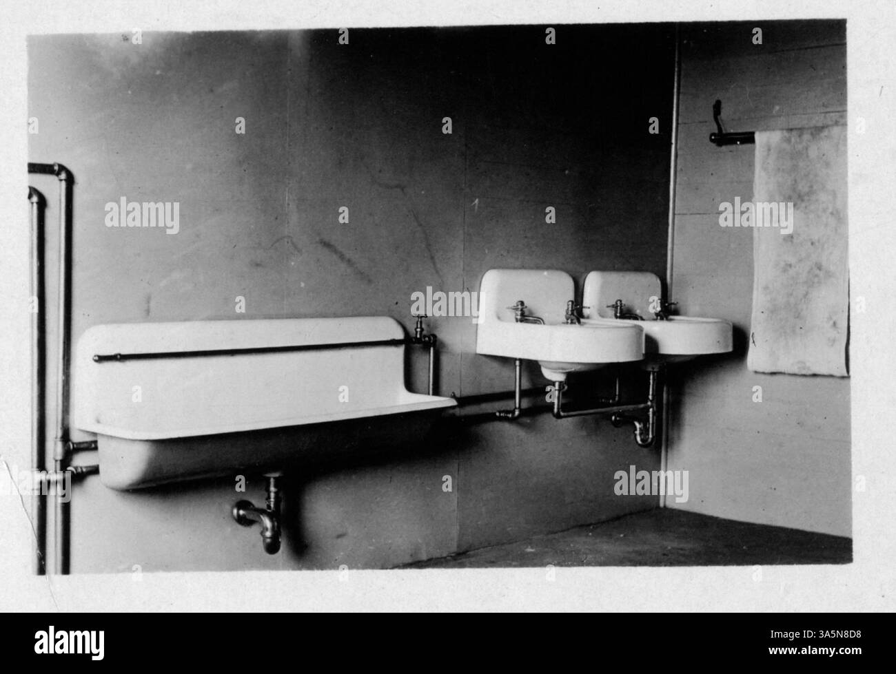This photograph depicts the men's bathroom at the 26th Street Sewer ...