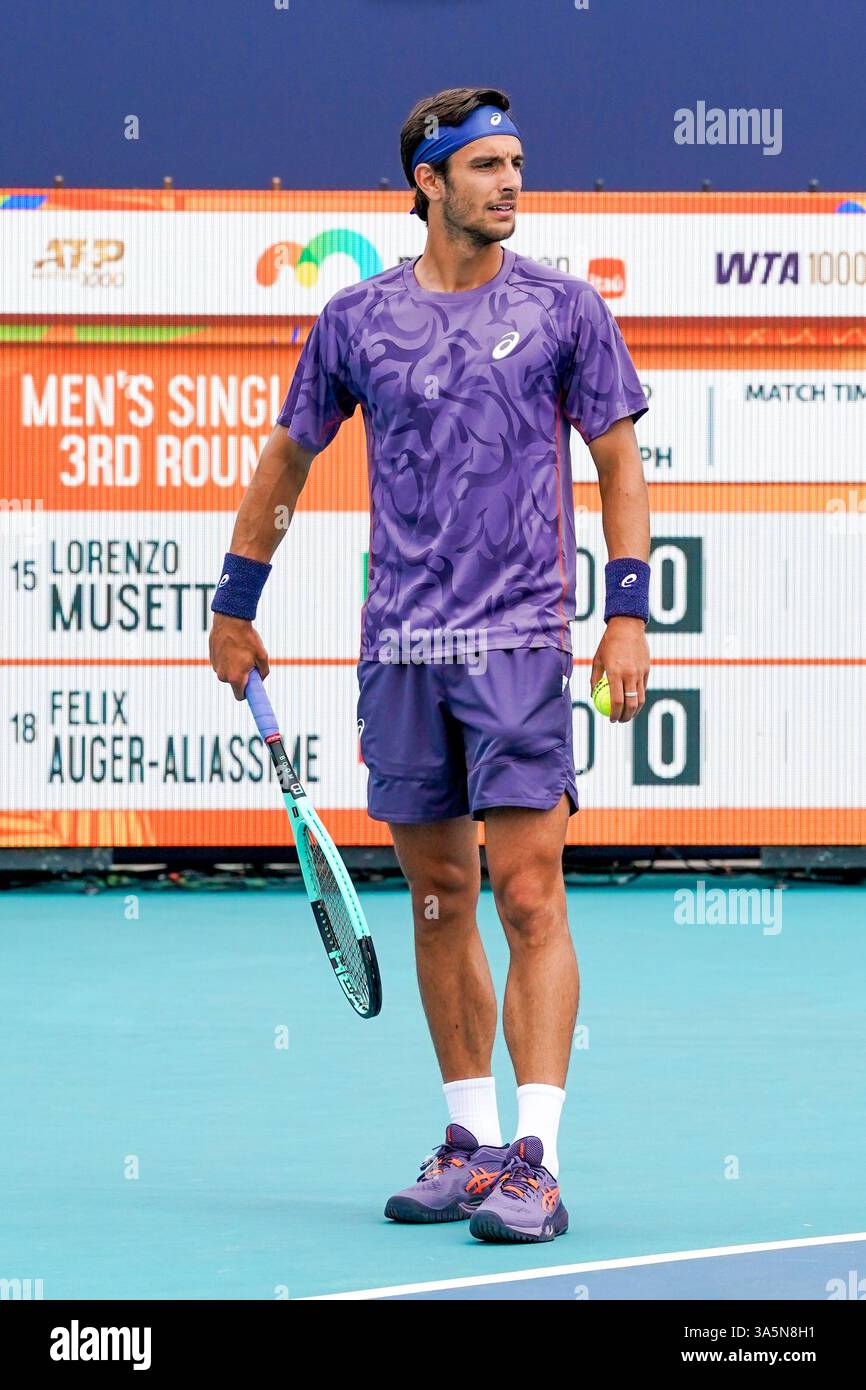 Miami, Florida, USA. 23rd Mar, 2025. Lorenzo Musetti (ITA) serves to Felix Auger-Aliassime (not ...