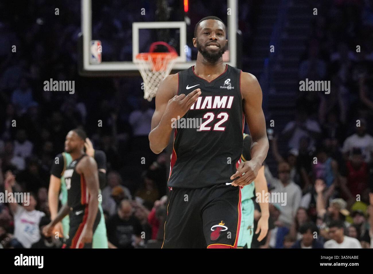 Miami Heat forward Andrew Wiggins (22) gestures after scoring a three ...