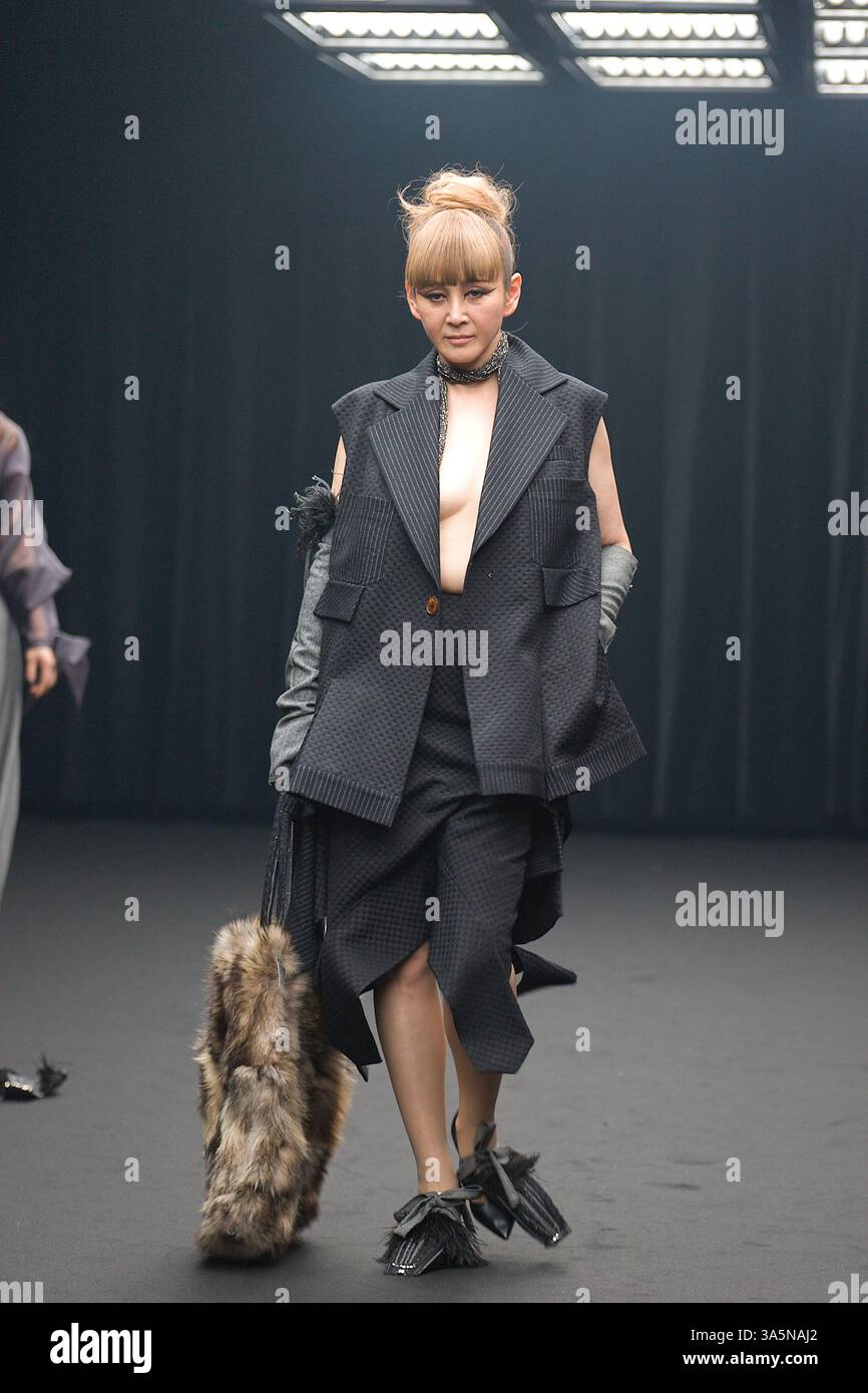 2025/03/20, Tokyo, a Model walks on the Runway at Toda Hall ...
