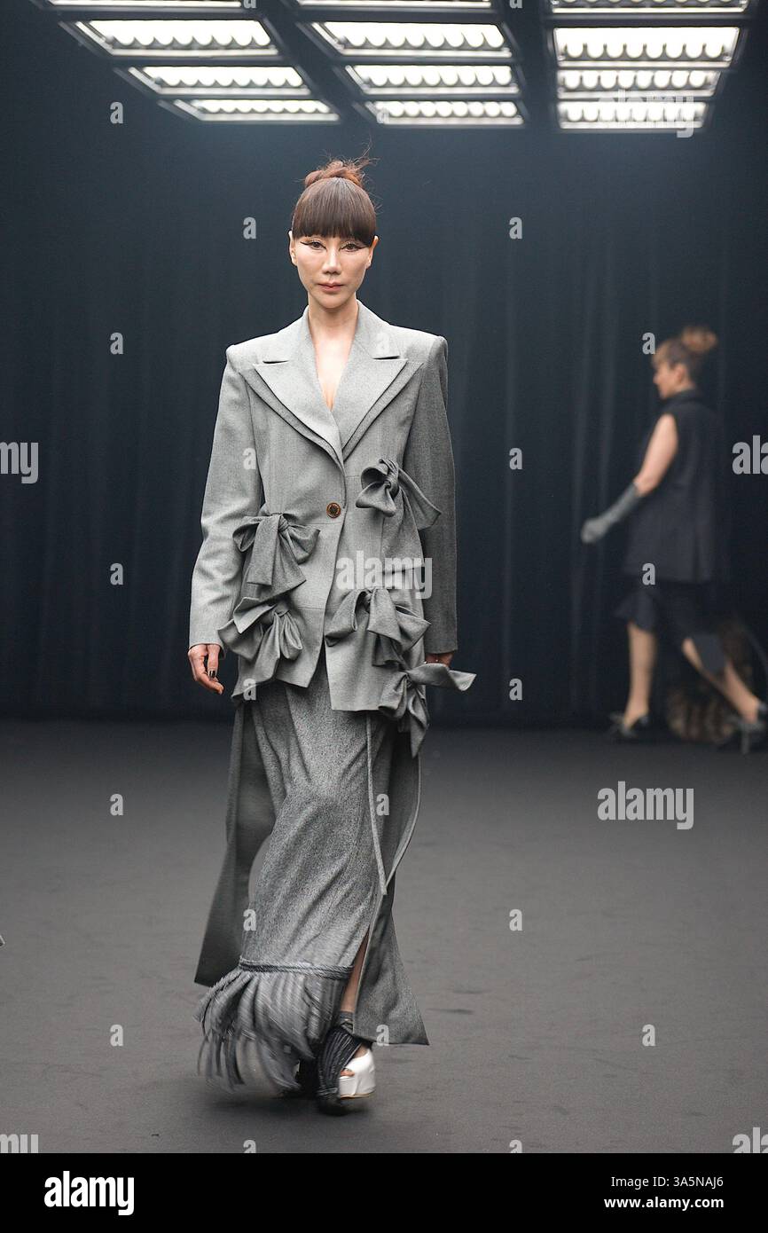 2025/03/20, Tokyo, a Model walks on the Runway at Toda Hall ...