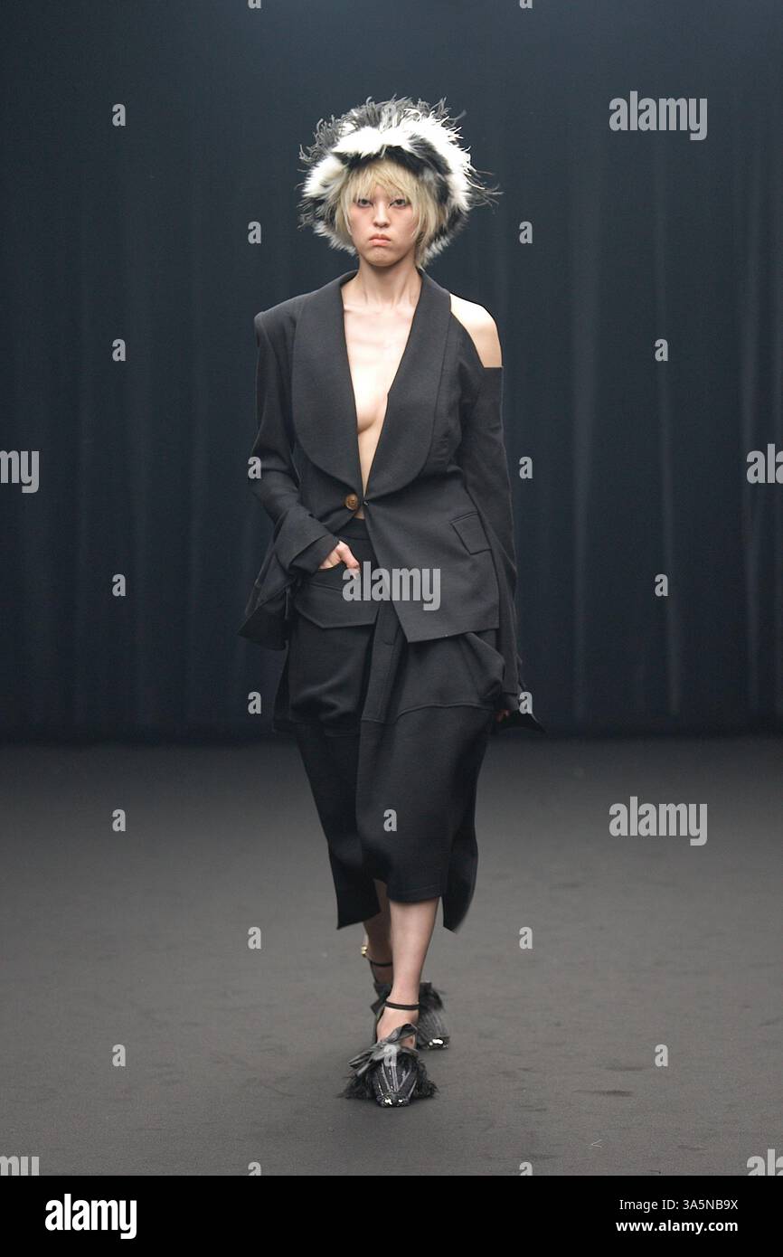 2025/03/20, Tokyo, a Model walks on the Runway at Toda Hall ...