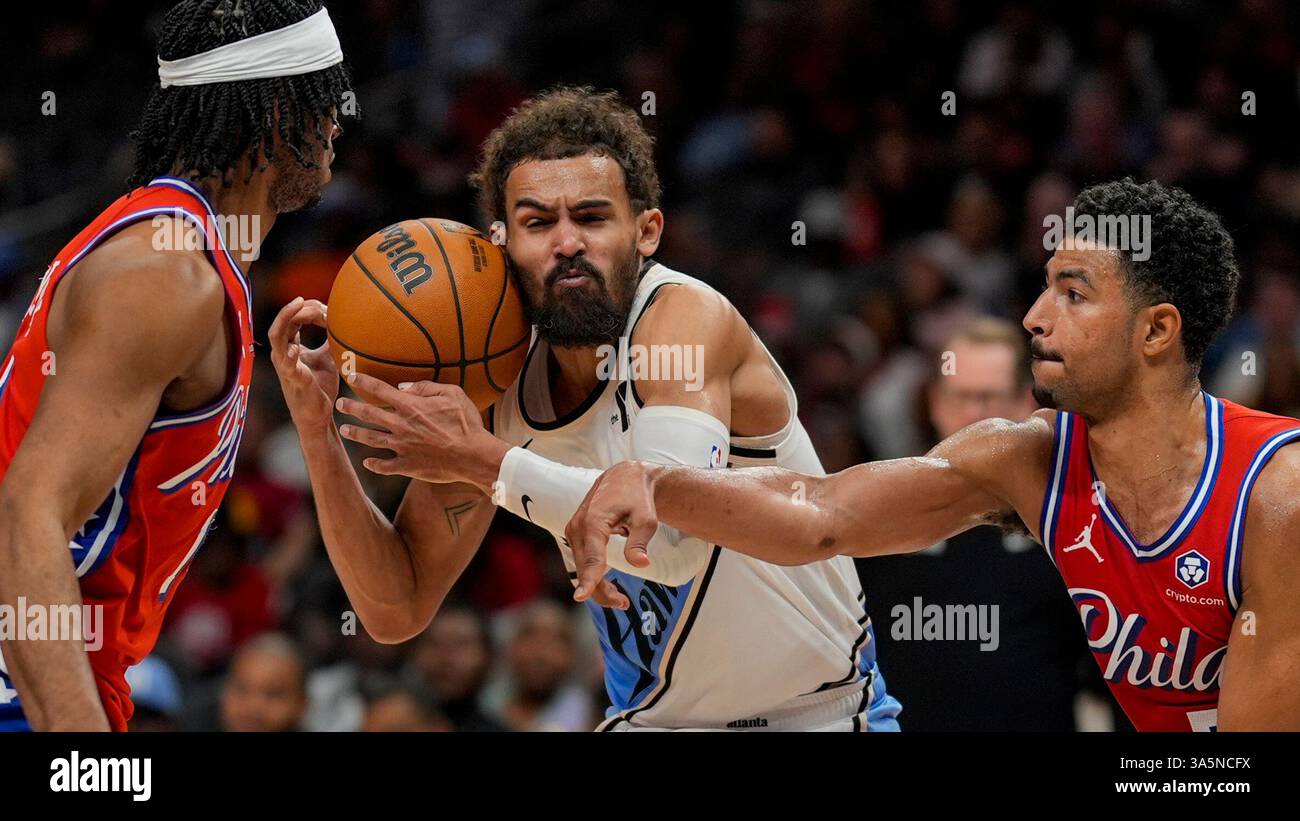 Atlanta Hawks guard Trae Young (11) drives past Philadelphia 76ers ...