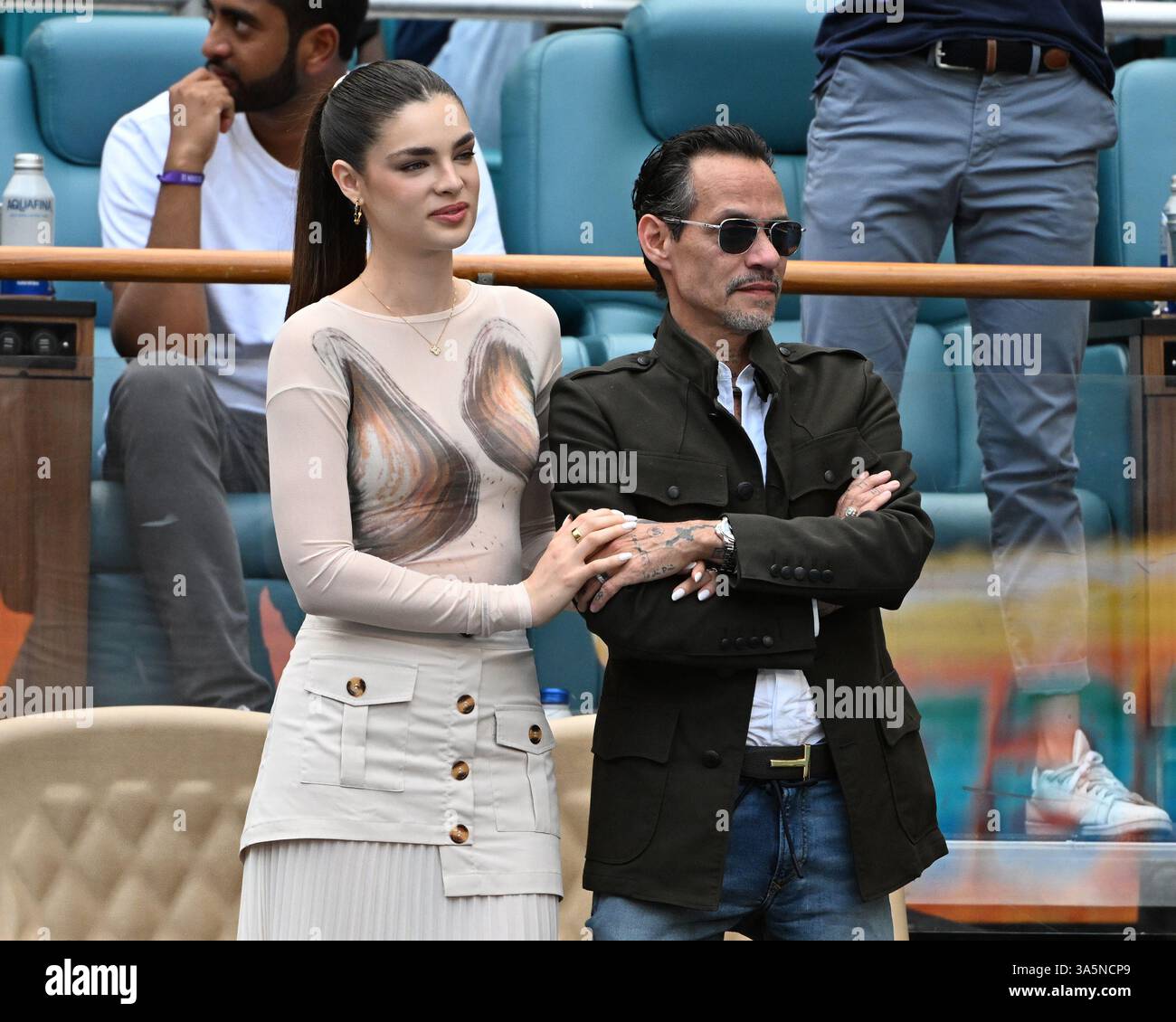 MIAMI GARDENS FL - MARCH 23: Marc Anthony and his wife Nadia Ferreira are seen watching Novak ...