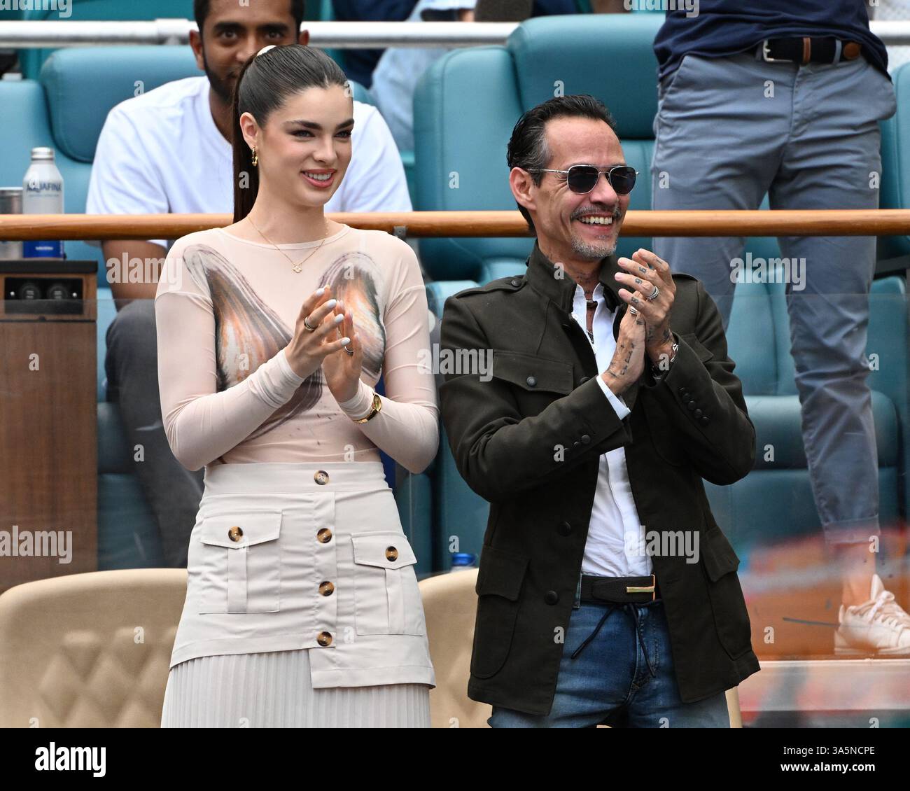 Miami Gardens FL, USA. 23rd Mar, 2025. Marc Anthony and his wife Nadia Ferreira are seen ...