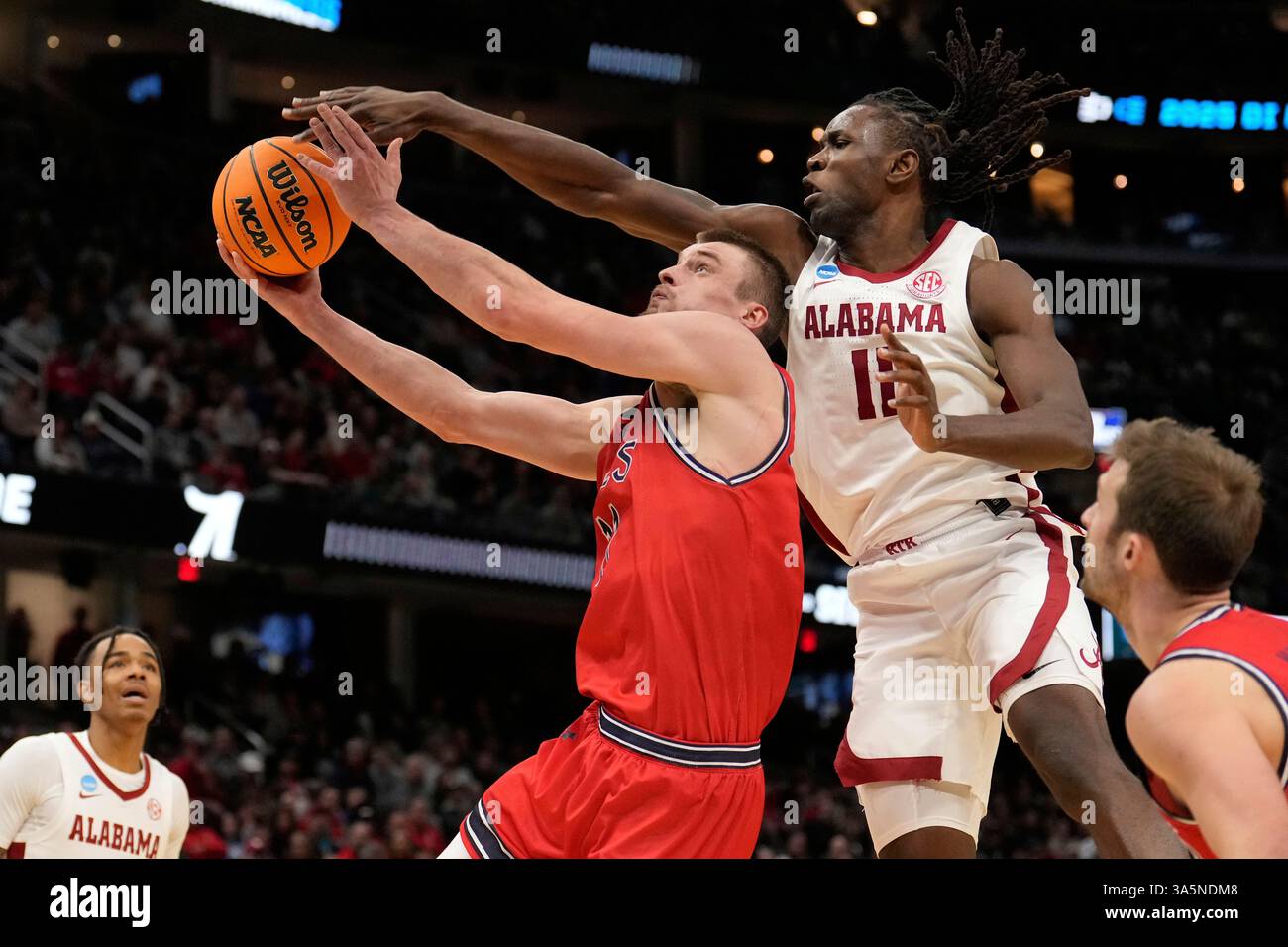 Alabama center Clifford Omoruyi, right, defends Saint Mary's center ...