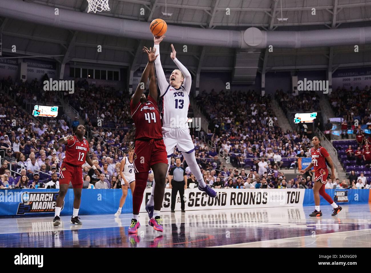 TCU's Sedona Prince (13) shoots over Louisville's Olivia Cochran (44 ...