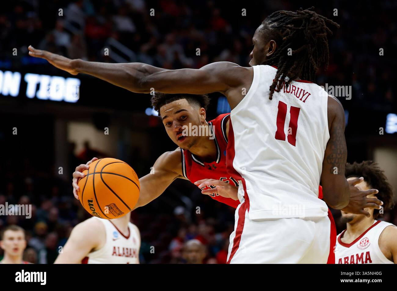 March 23, 2025: St. Mary's guard Jordan Ross (2) attempts to pass against Alabama center ...